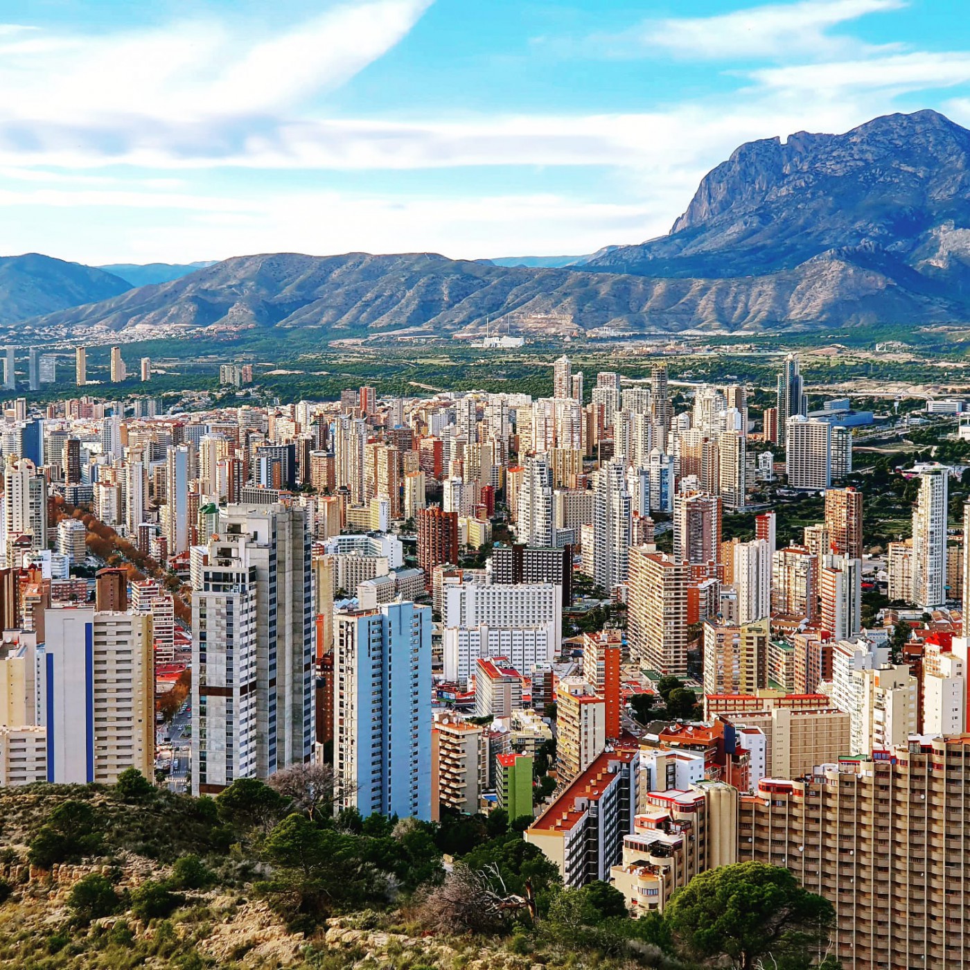 A large semi-detached house with a garden in the centre of Benidorm ...