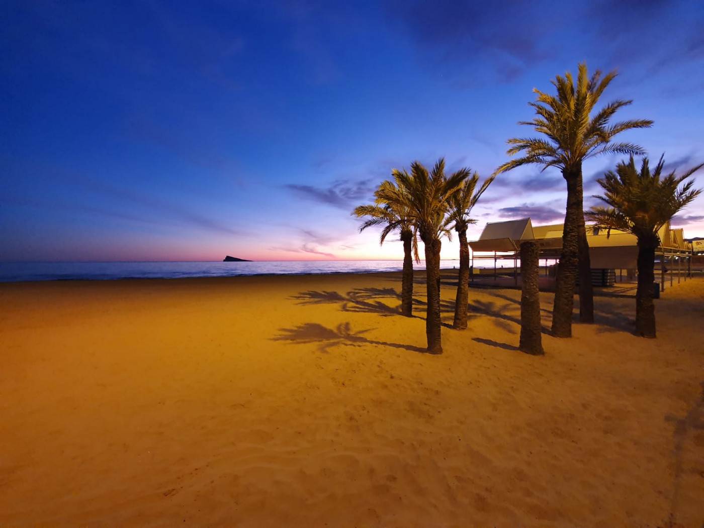 A large semi-detached house with a garden in the centre of Benidorm ...